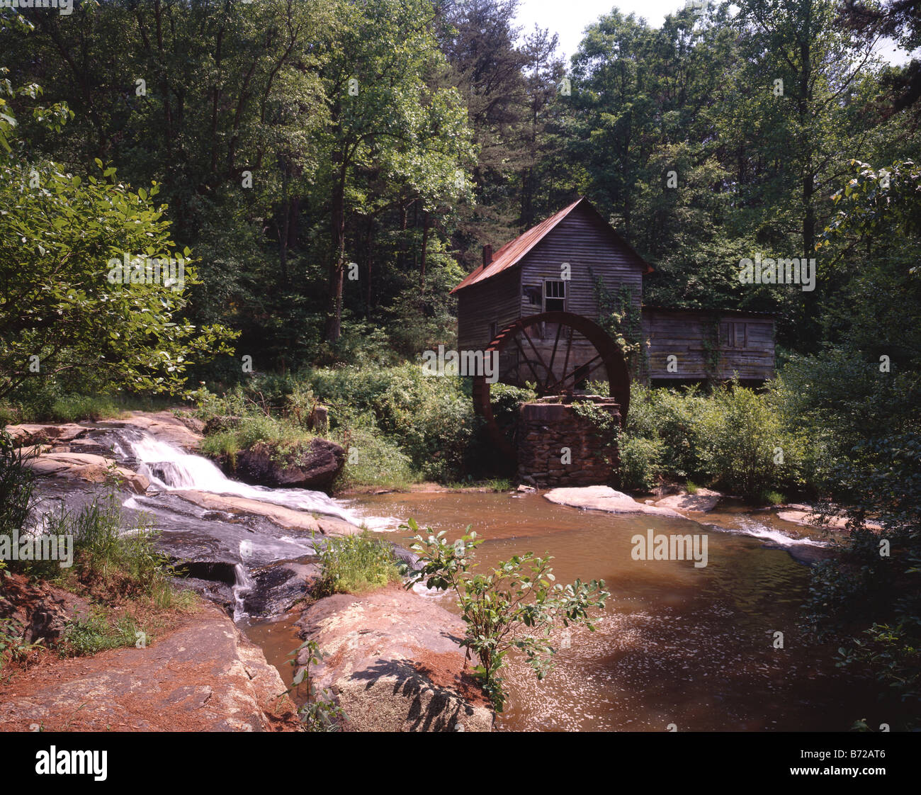 River with Mill in Spring Stock Photo - Alamy
