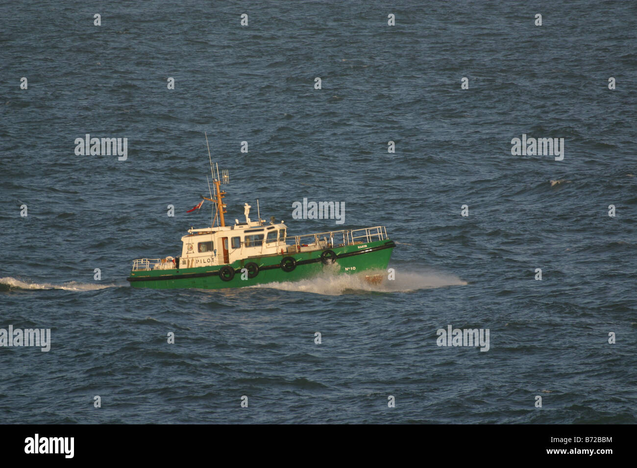 Tug pilot on Milford Haven estuary, blue sea. Pembrokeshire Wales ...