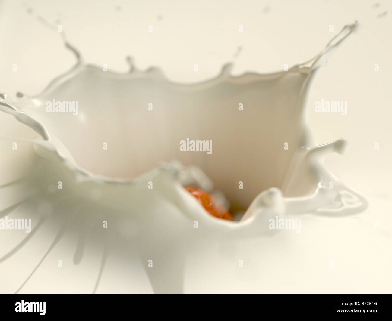 Milk Splashing Spray Stock Photo - Alamy