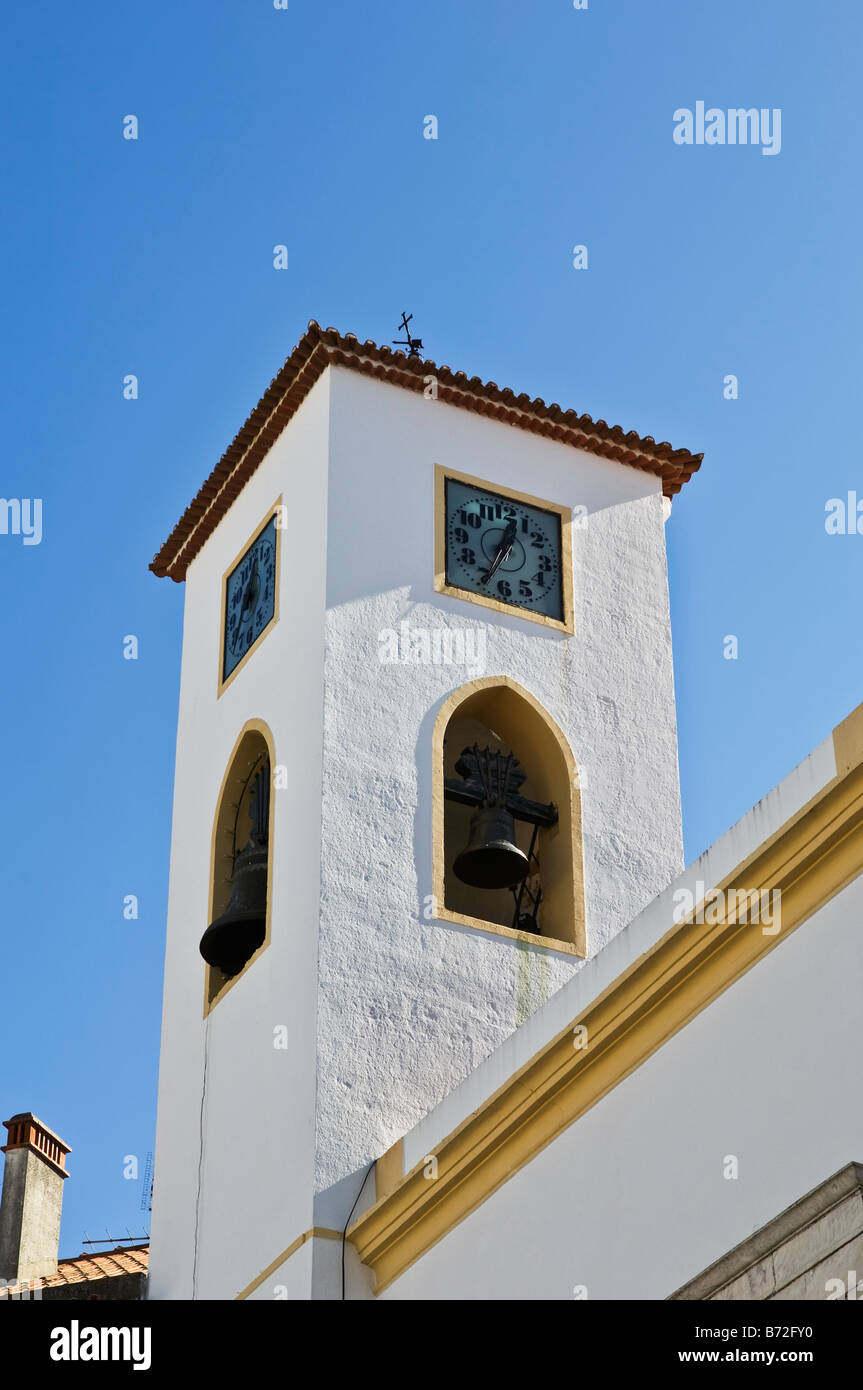 Traditional portuguese clock and bell tower in clear sky Stock Photo ...