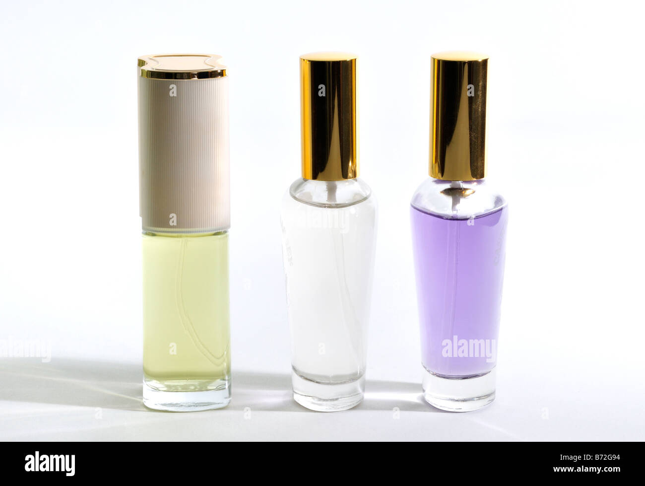 Three bottles of cologne on a white background. USA Stock Photo - Alamy