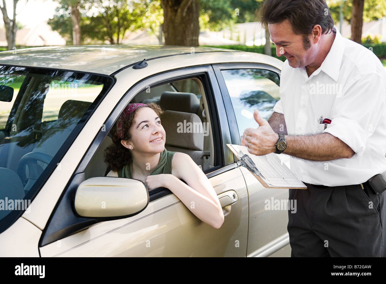 Teen girl driving test happy hi-res stock photography and images - Alamy