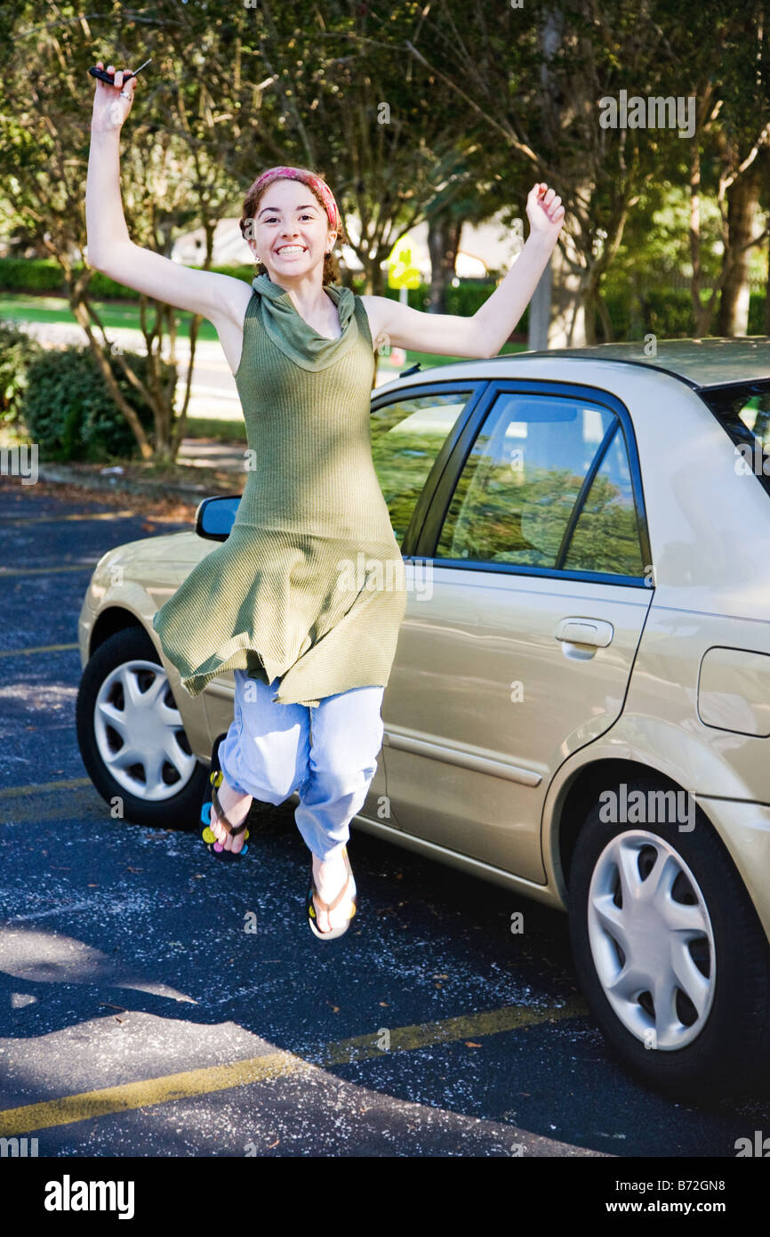 Teenager jumping car keys hi-res stock photography and images - Alamy
