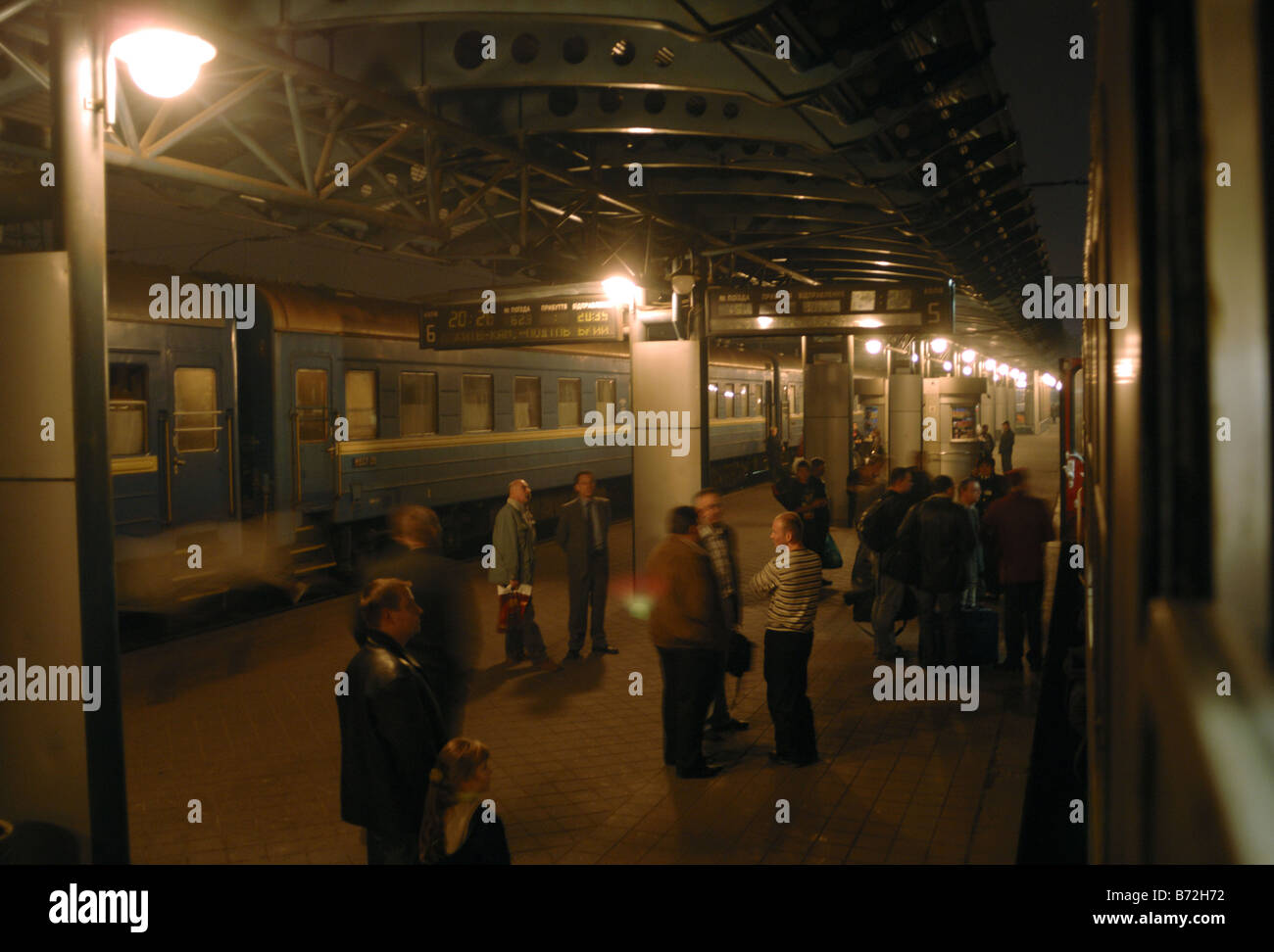 Kiev main passenger train station at night with departing trains Stock ...