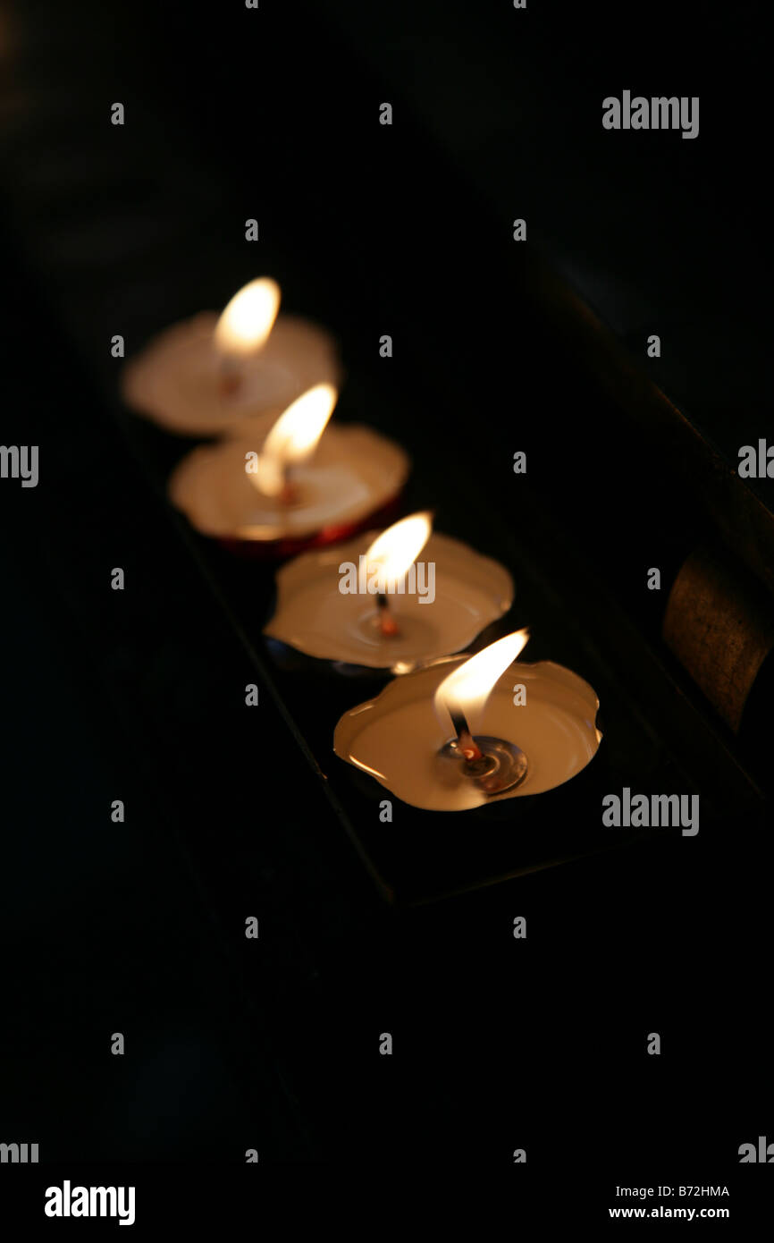Four yellow candles hi-res stock photography and images - Alamy