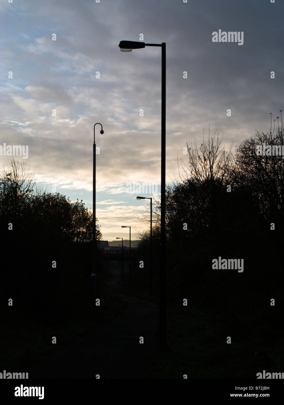 Lamp posts and CCTV lining urban path on Byker Link Newcastle upon Tyne ...