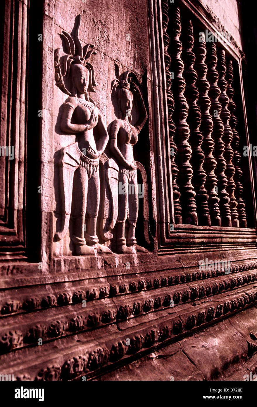 Detail of Apsara celestial dancer on exterior enclosing wall of 12th ...
