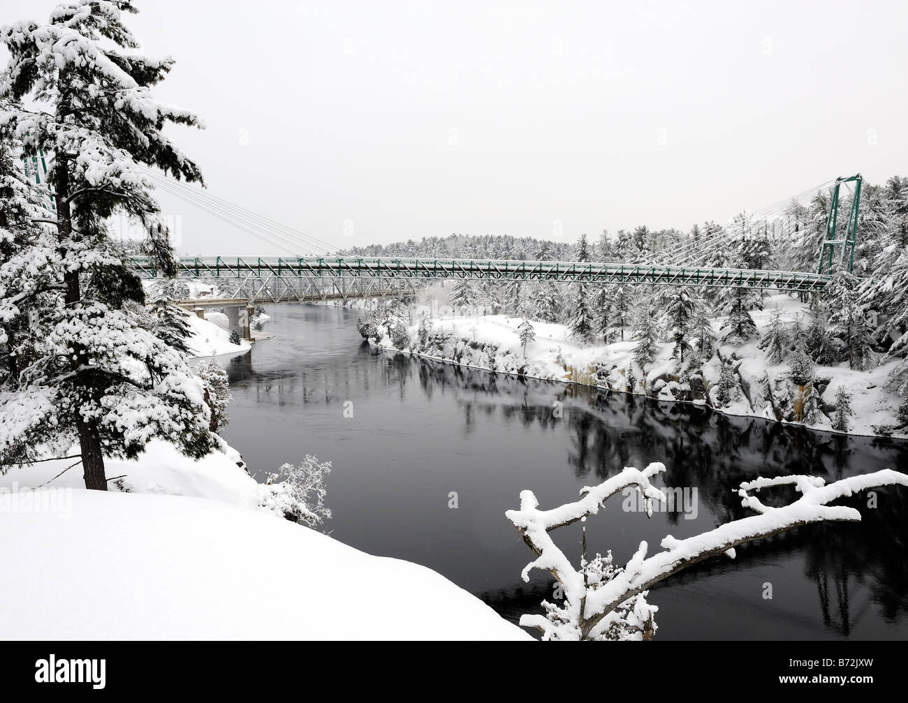 Snowmobile bridge over the French River, Ontario, Canada Stock Photo ...