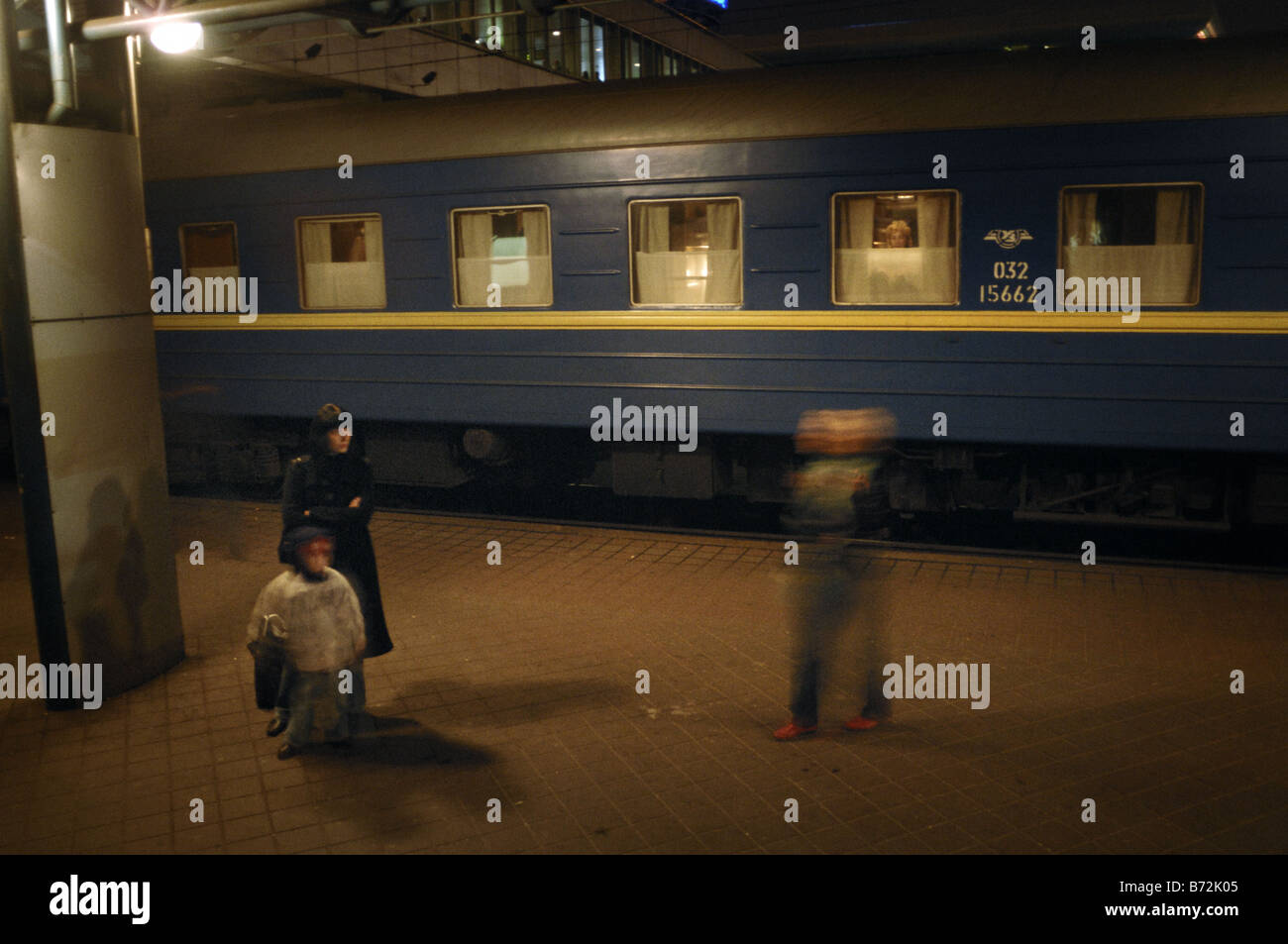 Kiev main passenger train station at night with departing trains Stock ...