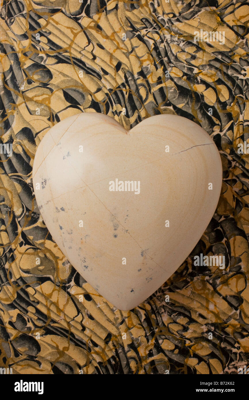 White heart shaped stone hi-res stock photography and images - Alamy