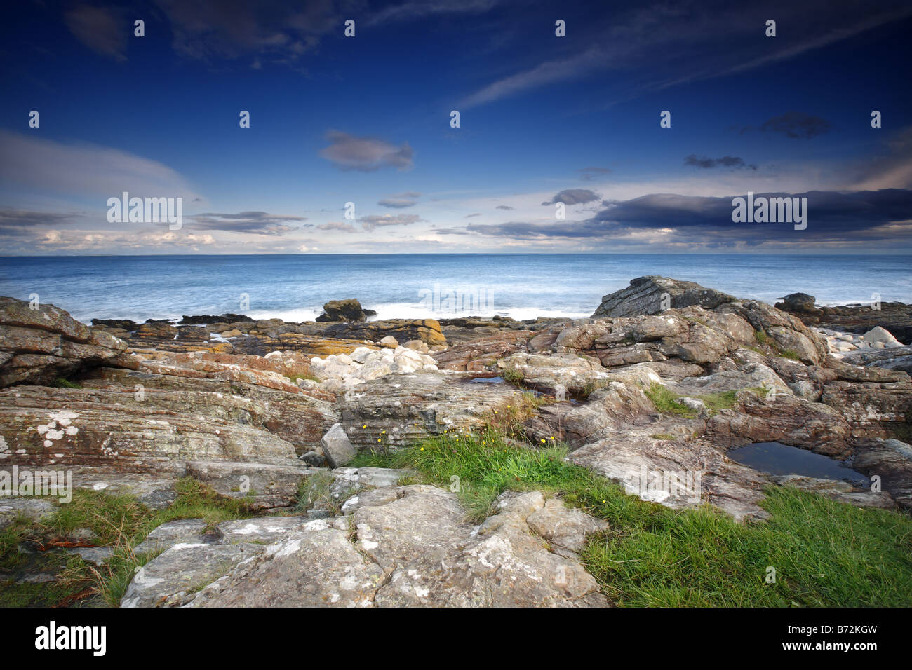 Rocky coastal seascape of Eastern Ireland Stock Photo - Alamy