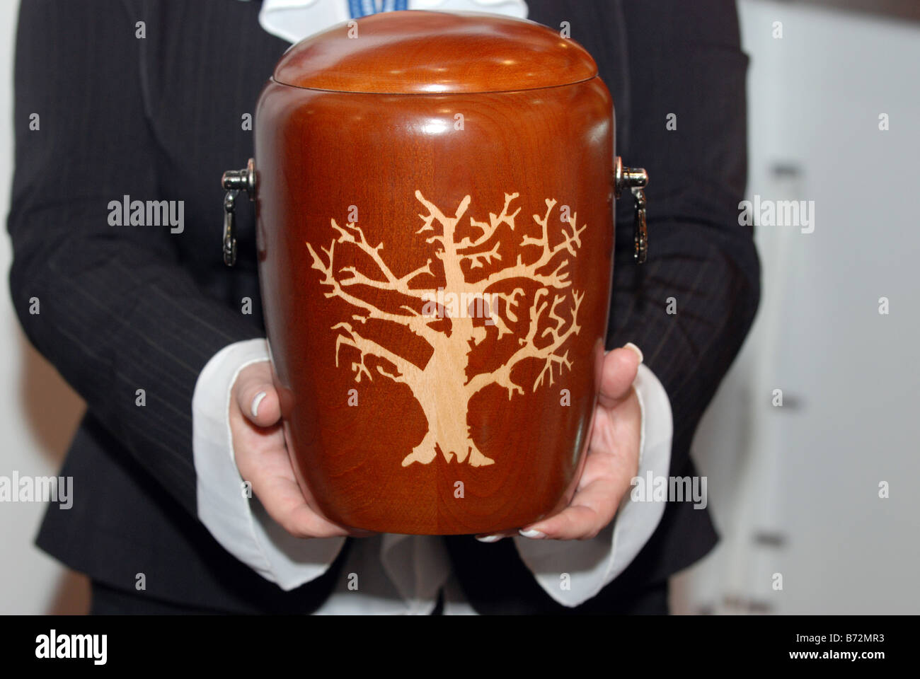 Sample of wooden ash urns on "Memento" Funeral Expo in Warsaw, Poland ...