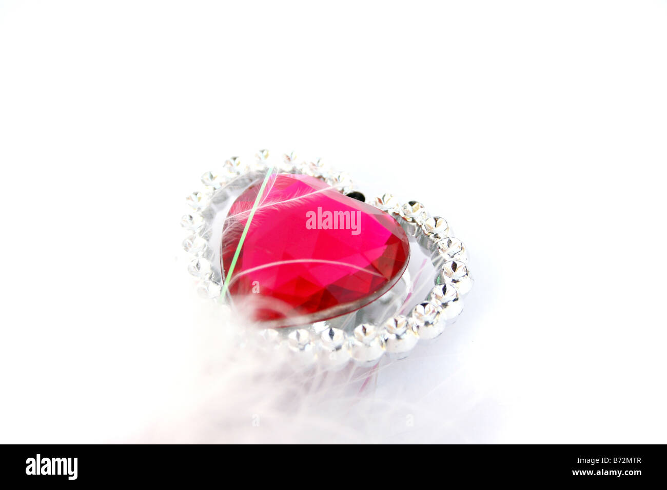 Red heart stone on white background Stock Photo - Alamy