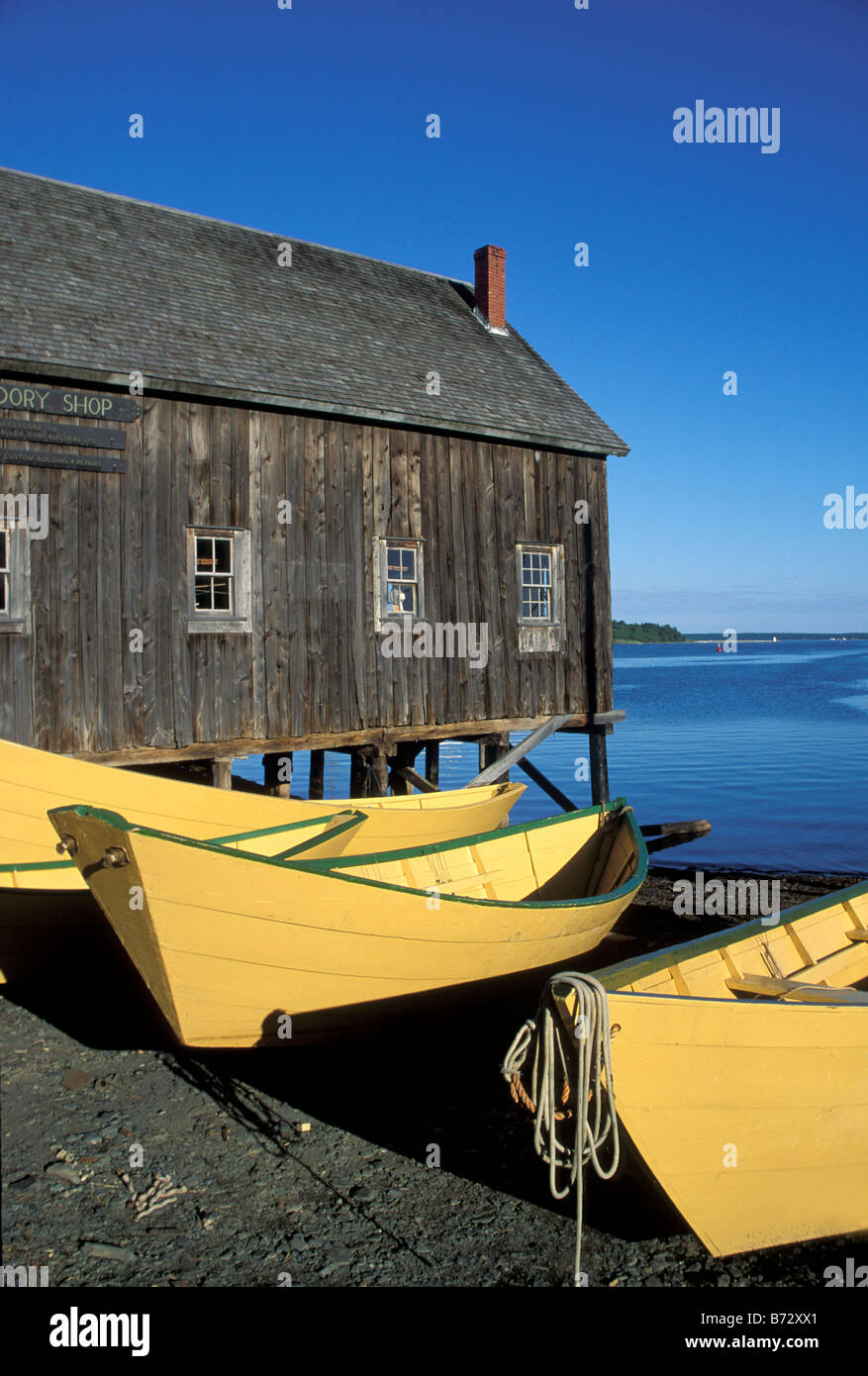 Yellow rowboats on shore in Lunenburg, Nova Scotia Stock Photo - Alamy