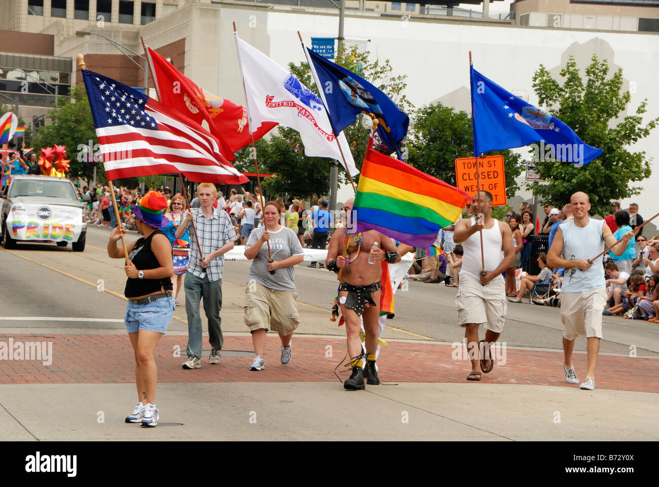 Carrying flags hi-res stock photography and images - Alamy
