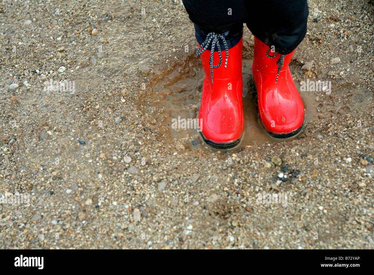 Child Splashing Puddles High Resolution Stock Photography and Images ...