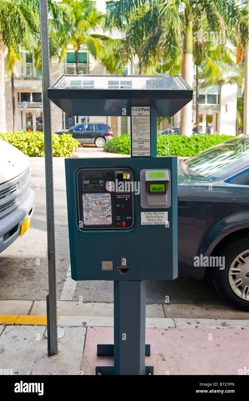 Miami style parking pay & display cash machine Stock Photo - Alamy