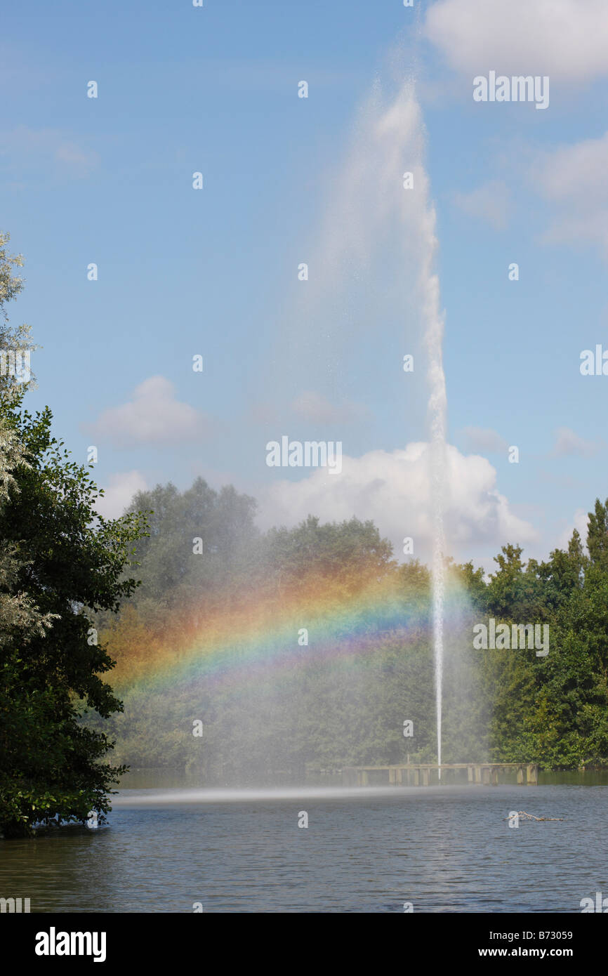 Water feature in park creating a rainbow in its spray Stock Photo - Alamy