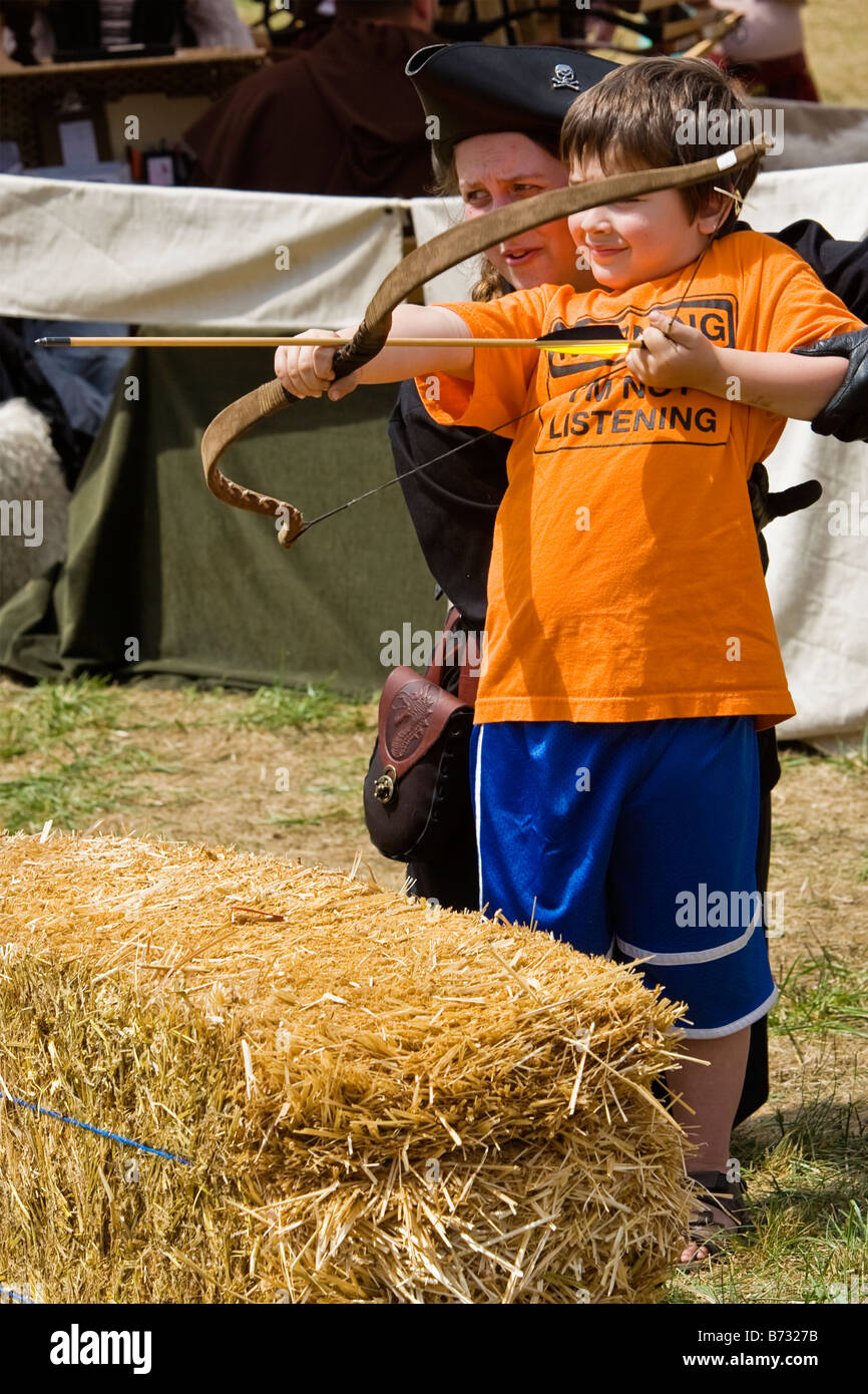 Arrow shooting boy hi-res stock photography and images - Alamy