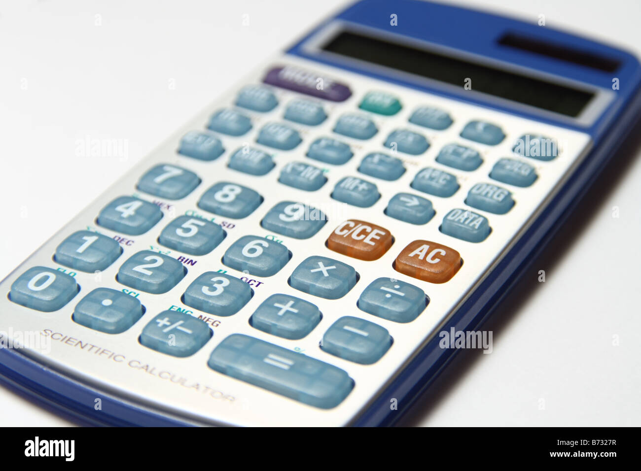Calculator on white background Stock Photo - Alamy