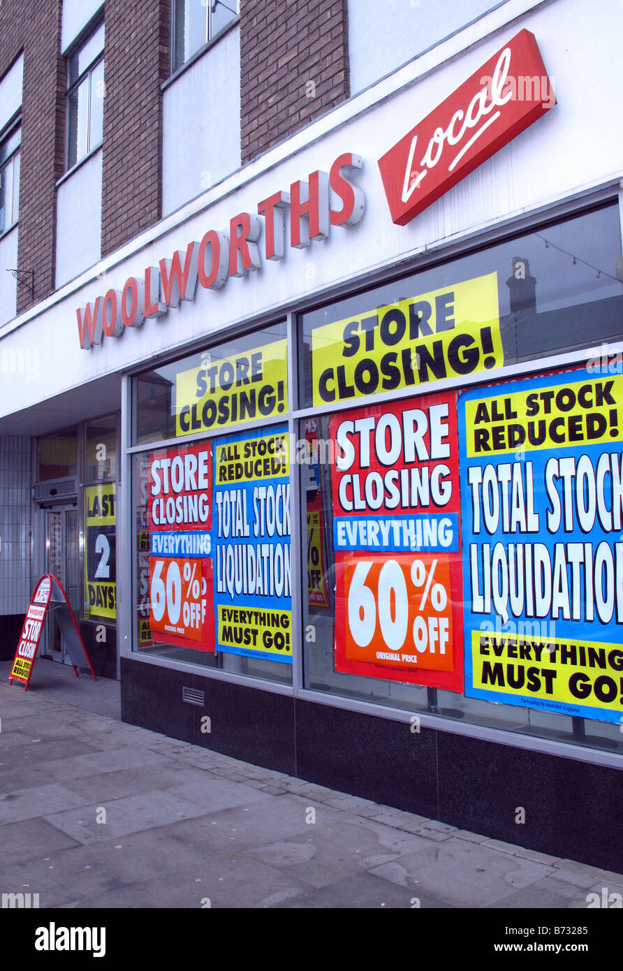 External facade & window liquidation sale signs in Woolworths store ...