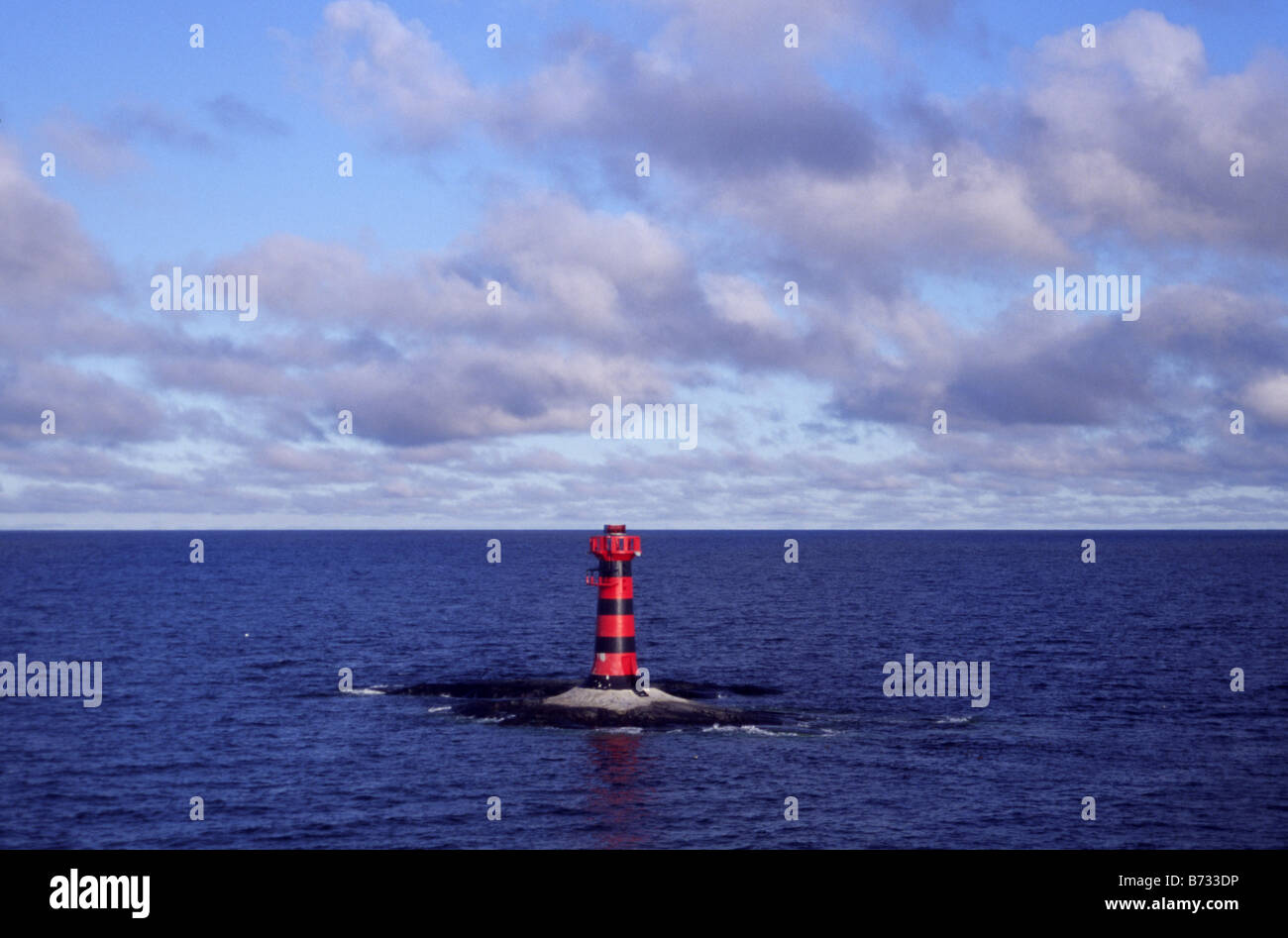 Lighthouse at the western extremity of the Aland islands marking the ...