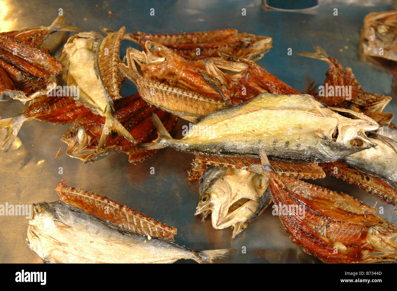 Whole fried fish hi-res stock photography and images - Alamy