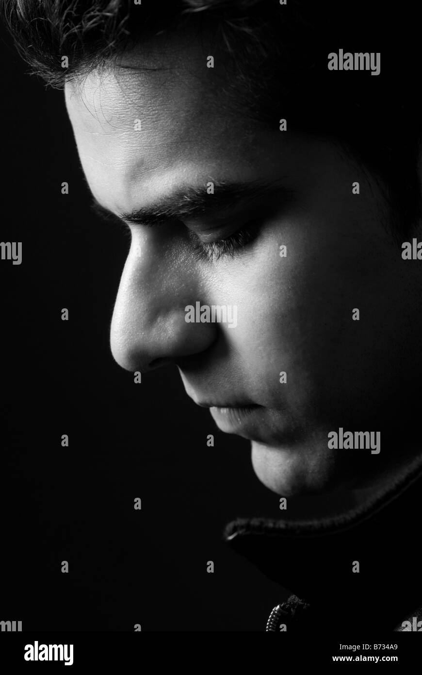 Man face profile dark Black and White Stock Photos & Images - Alamy