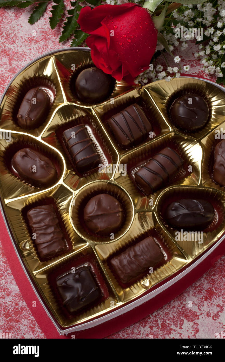 Heart shaped box of chocolate candy Stock Photo - Alamy