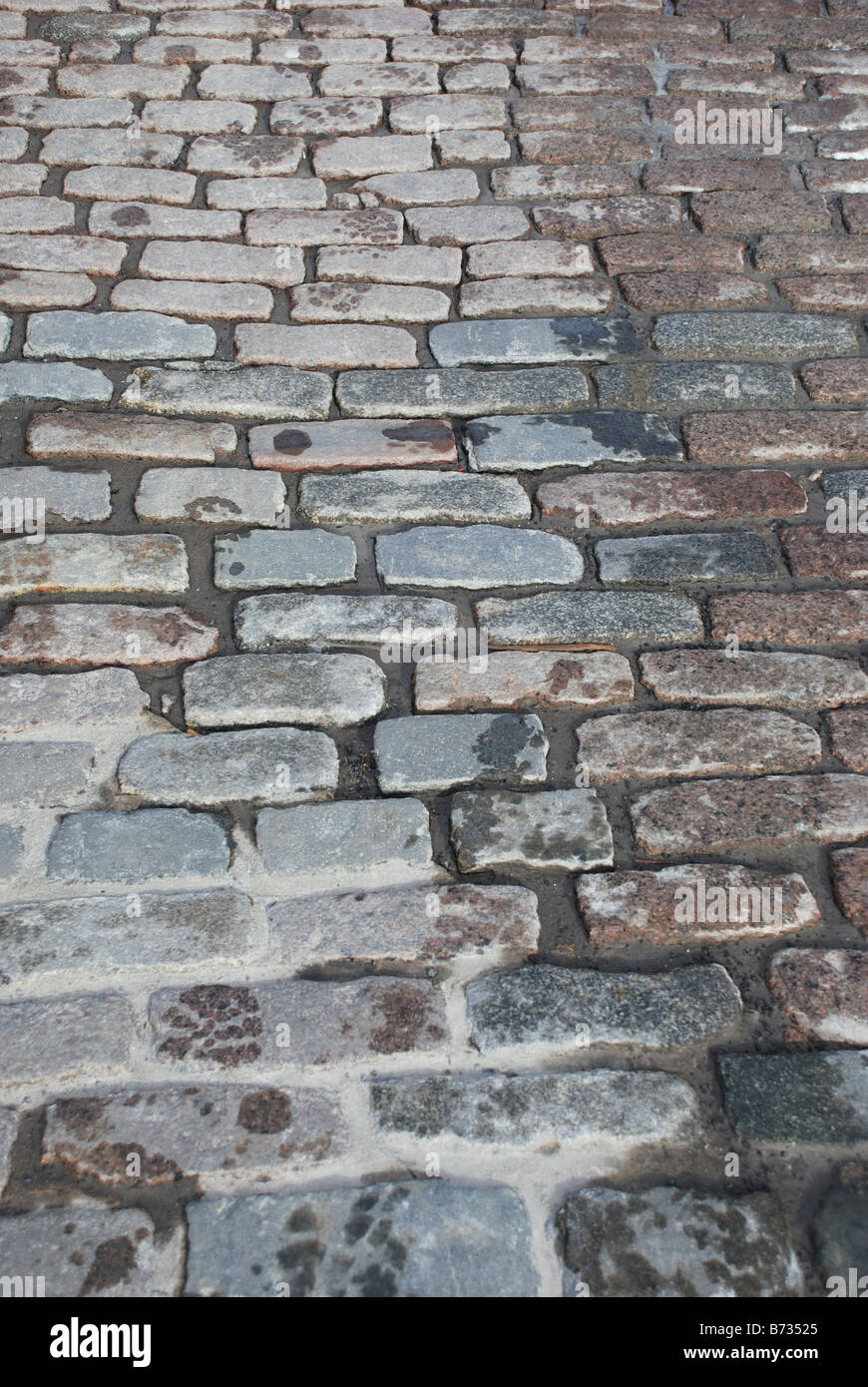 Wet cobblestone road hi-res stock photography and images - Alamy