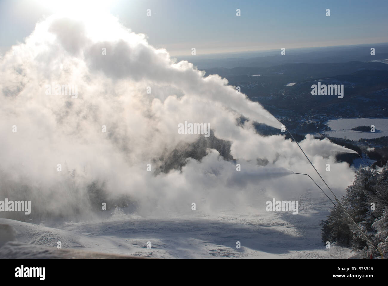 Working snow gun at ski slope Stock Photo - Alamy