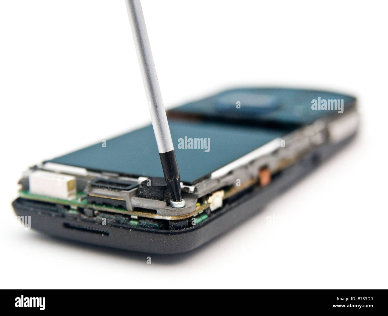 Disassembling a mobile phone Stock Photo - Alamy