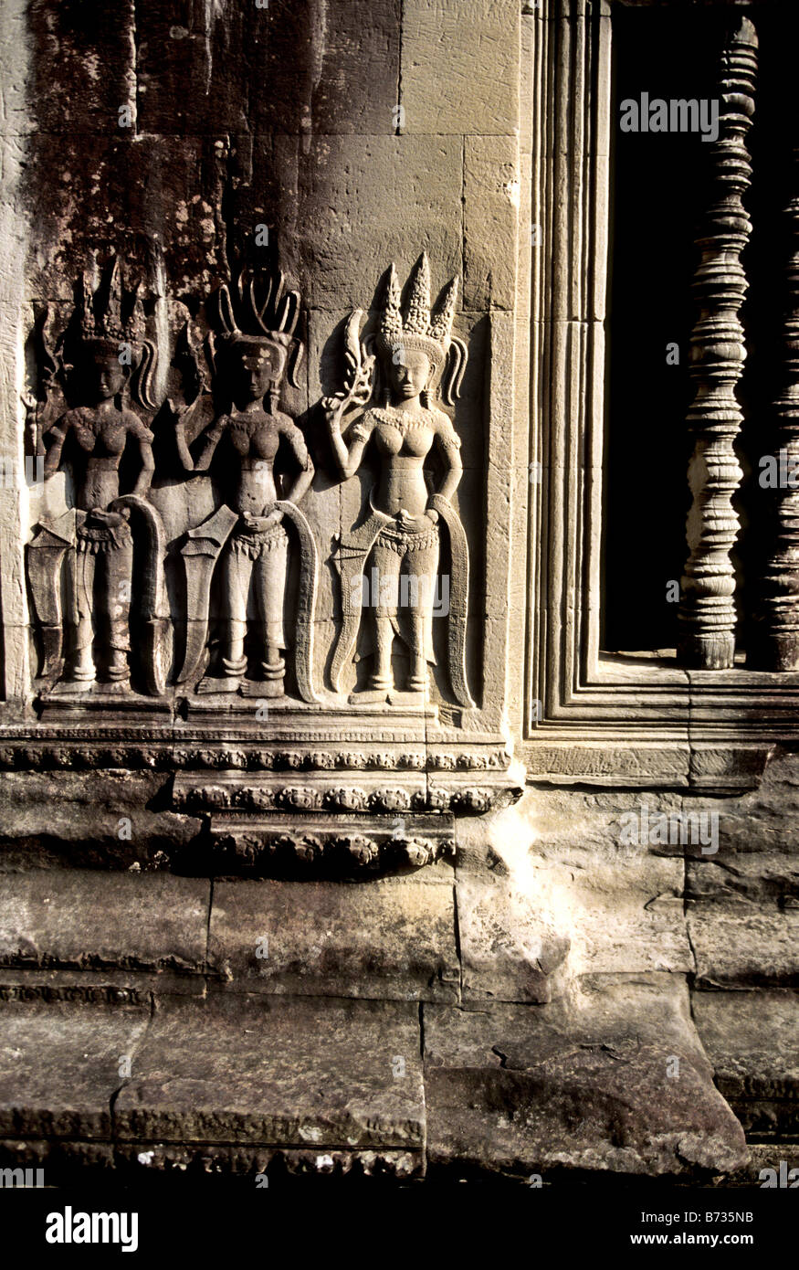 Detail of Apsara celestial dancer on exterior enclosing wall of 12th ...
