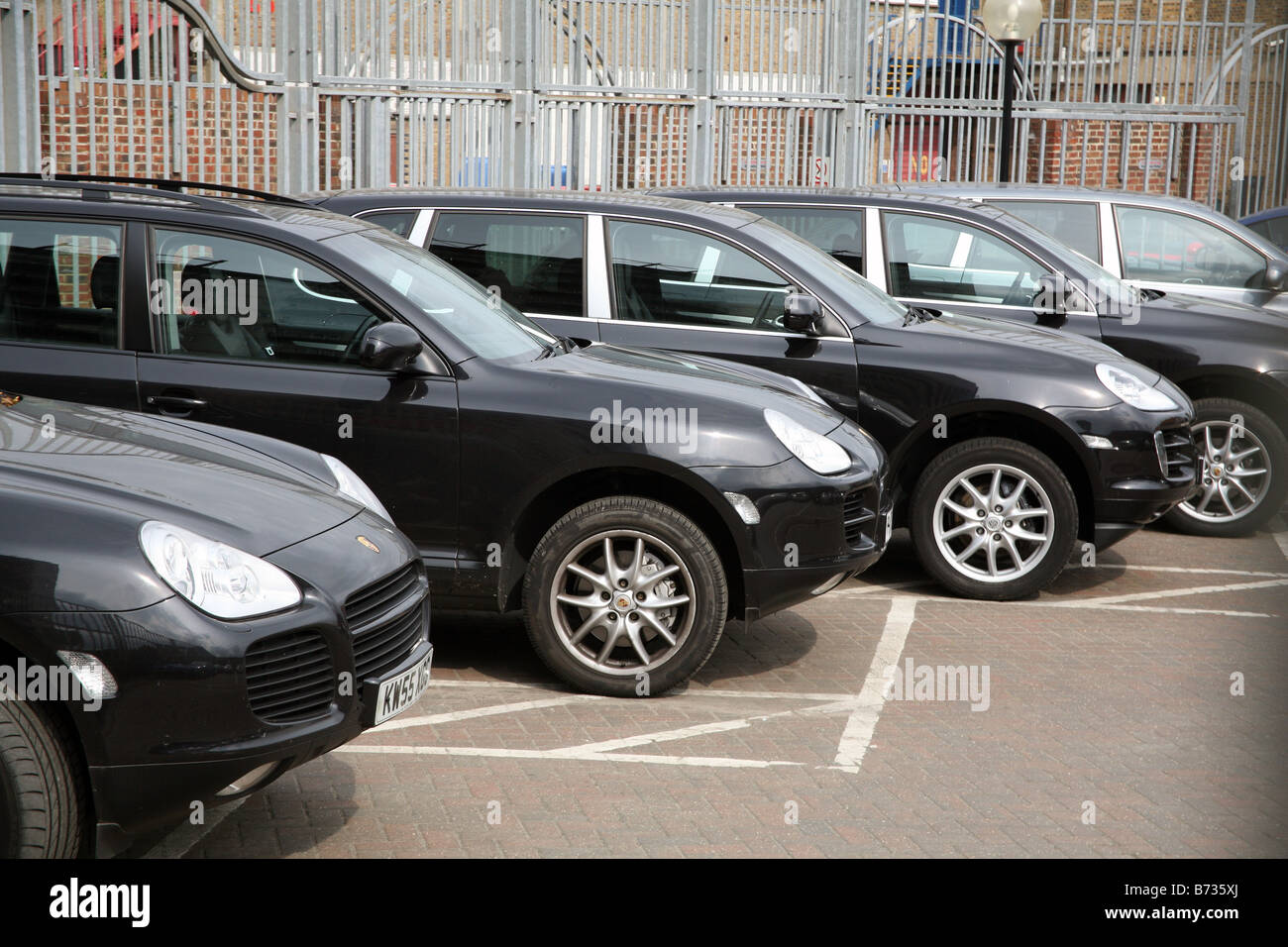 Porsche Cayenne gas guzzling 4x4s await buyers at London dealer Stock ...