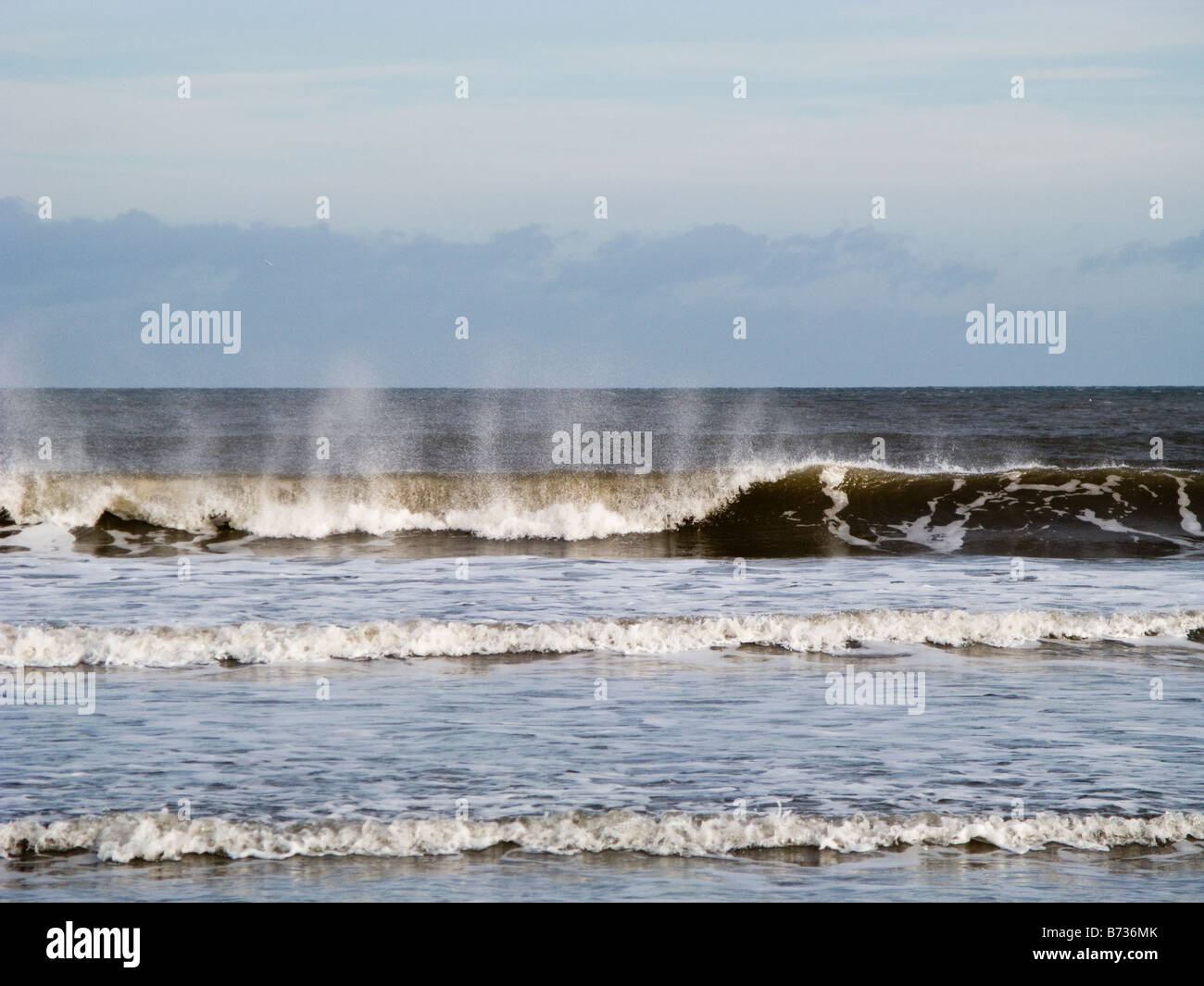 Waves breaking on the beach on Longsands Tynemouth Stock Photo - Alamy