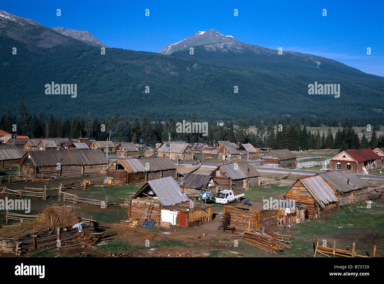 Log houses at Tuwa village in Kanas national park in Xinjiang in China ...
