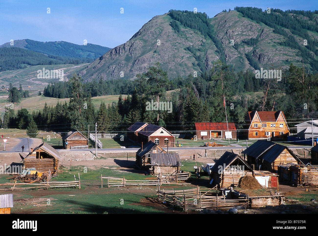 Log houses at Tuwa village in Kanas national park in Xinjiang in China ...