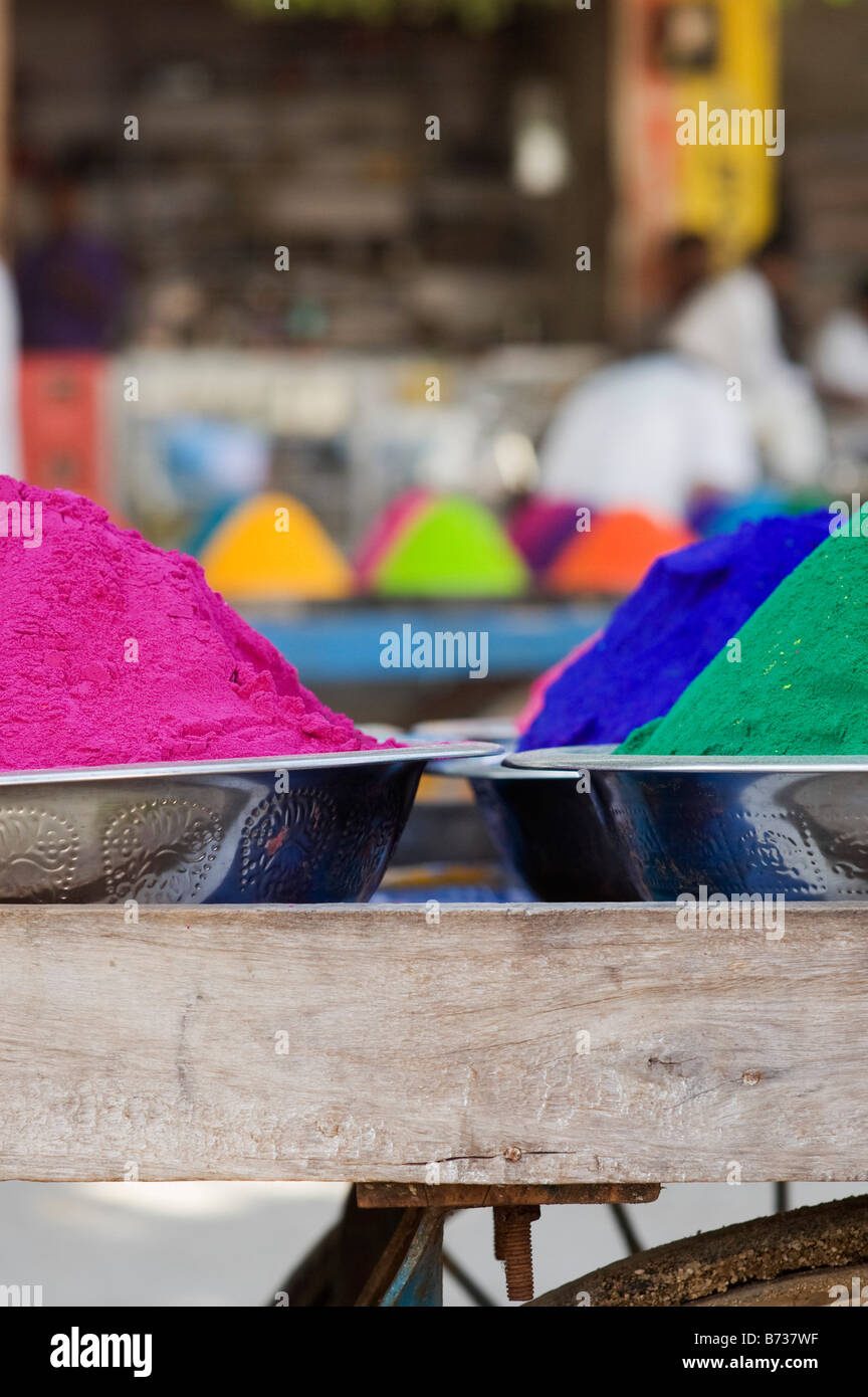 Coloured Indian powder in metal bowls used for making rangoli designs ...