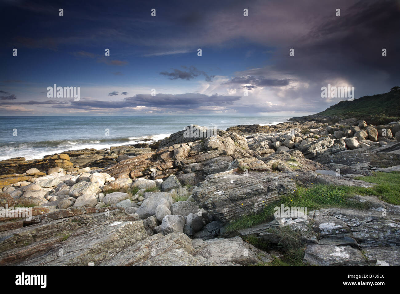 Rocky coastal seascape of Eastern Ireland Stock Photo - Alamy