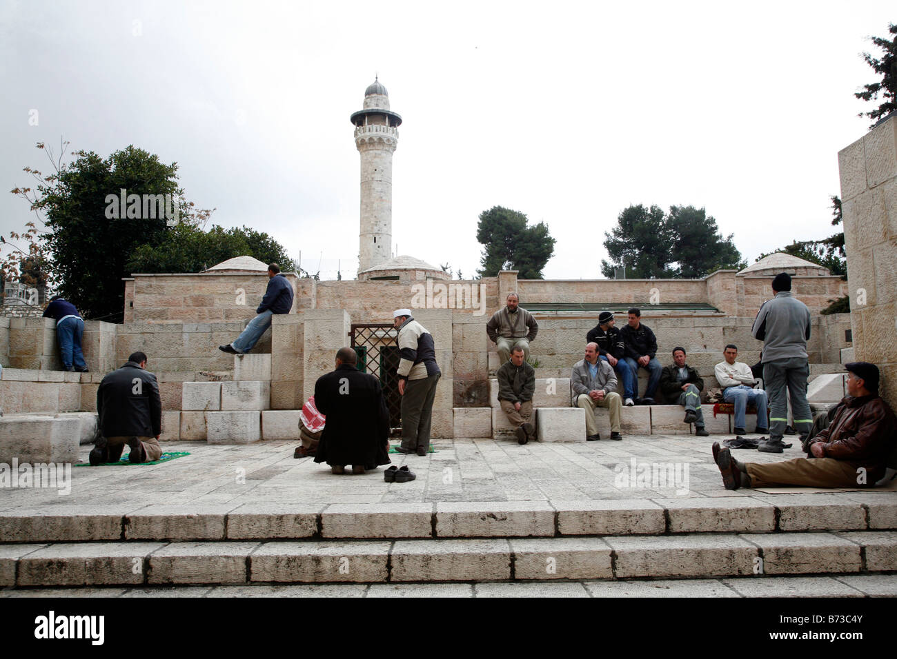 Palestinian Muslims preparing to pray in the Old City of Jerusalem ...