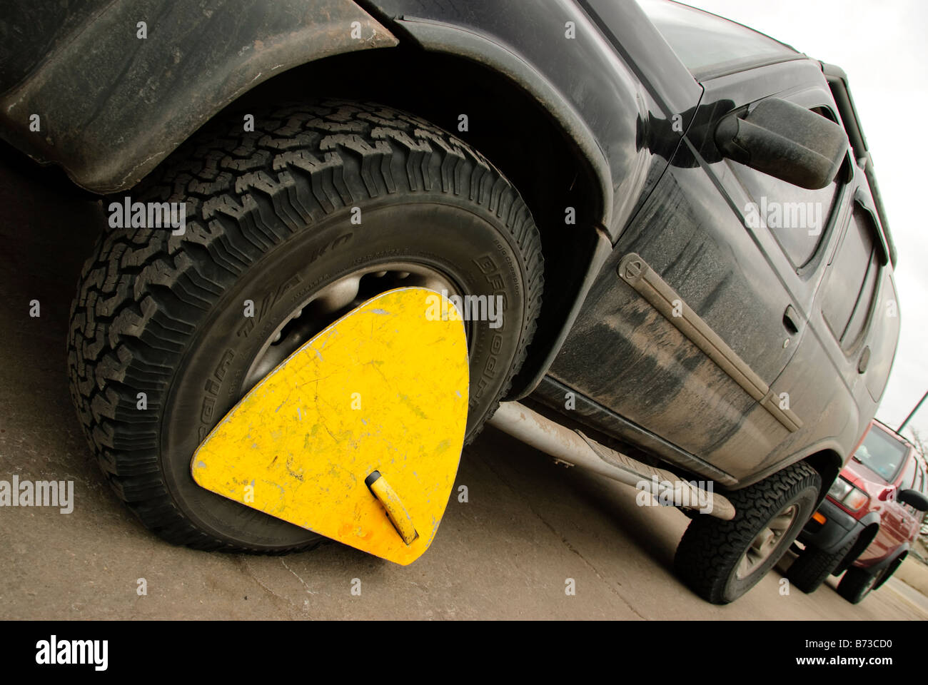A booted car on the street Stock Photo - Alamy