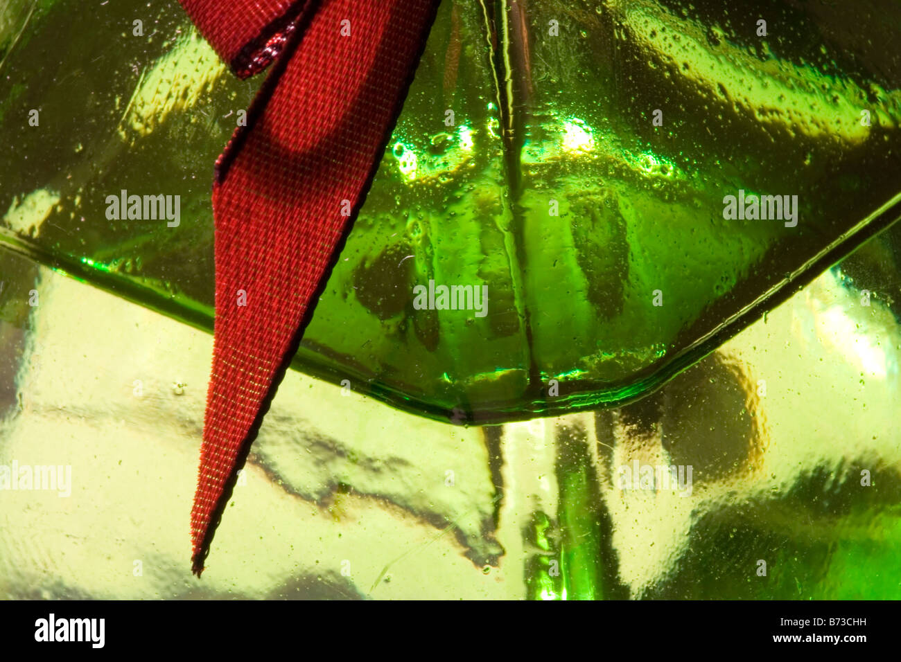 Light shines through a green bottle Stock Photo - Alamy