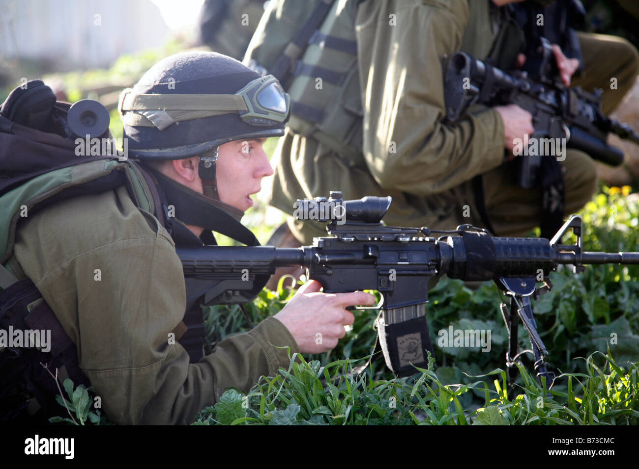 Israeli soldiers shooting rubber bullets at Palestinian stone throwers ...