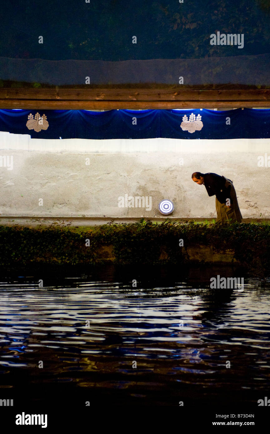 A Kyudoka studying his target in a Dojo in Yudanaka, Japan Stock Photo ...