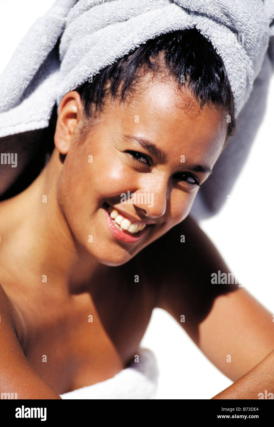 20 year old mulatto mixed race woman wearing a bath towel Stock Photo ...