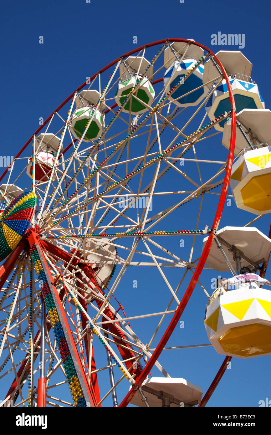 fairground ferris wheel on clock tower square at the V&A waterfront ...
