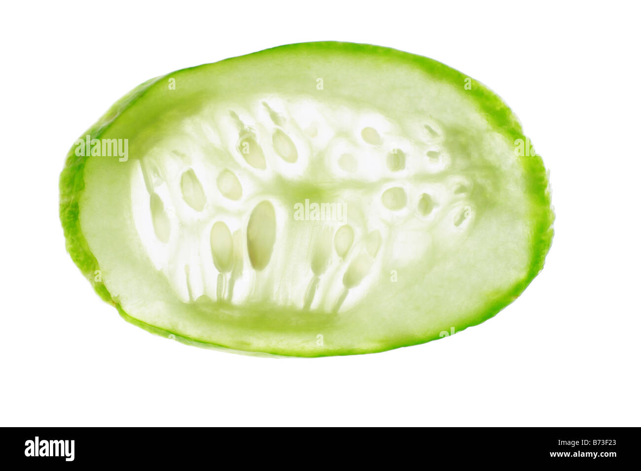 Close up of a thin slice cucumber on white background Stock Photo - Alamy