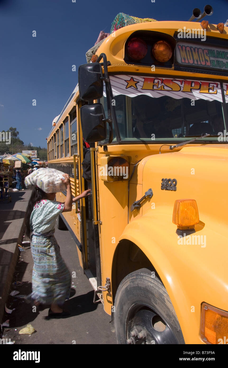 Bus station scene where so called "chicken buses" gather to transport ...