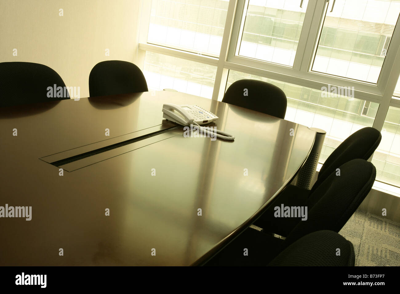 Meeting room Table Chair Window Telephone Stock Photo - Alamy