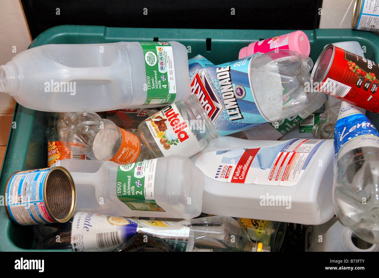 Assortment of plastic / glass bottles and tin cans for recycling Stock ...